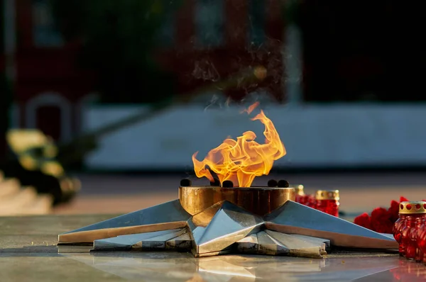 Flame of eternal fire close-up. Constantly burning fire. The memory of ...