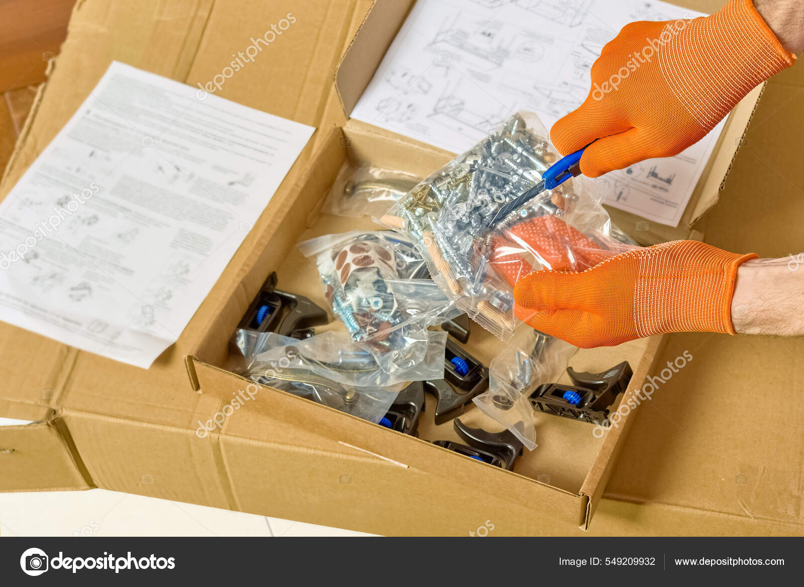 Man Unpacks Package Furniture Fittings Knife Opened Cardboard Box ...