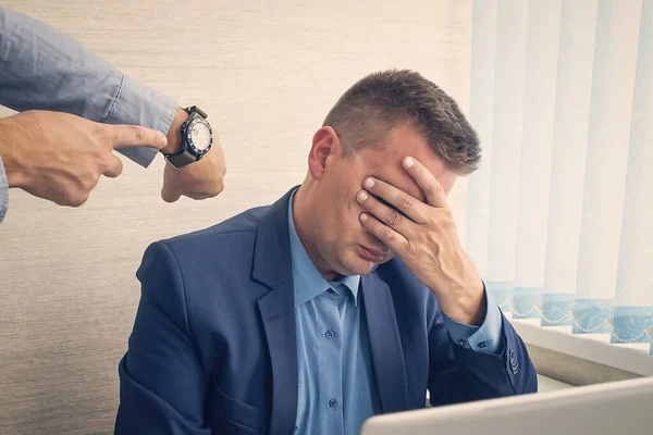 Keep track of time. man point at clock. being late at work. The boss ...