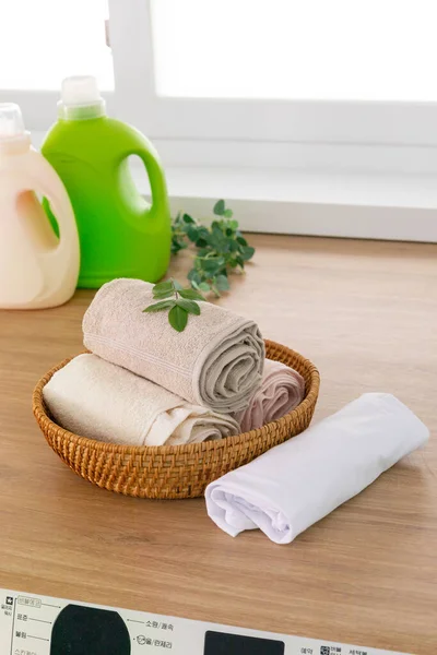 aesthetic laundry concept, detergent and towels - Stock Image - Everypixel