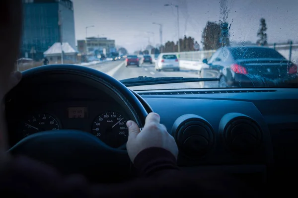 An unrecognized driver is driving around the city with high speed ...
