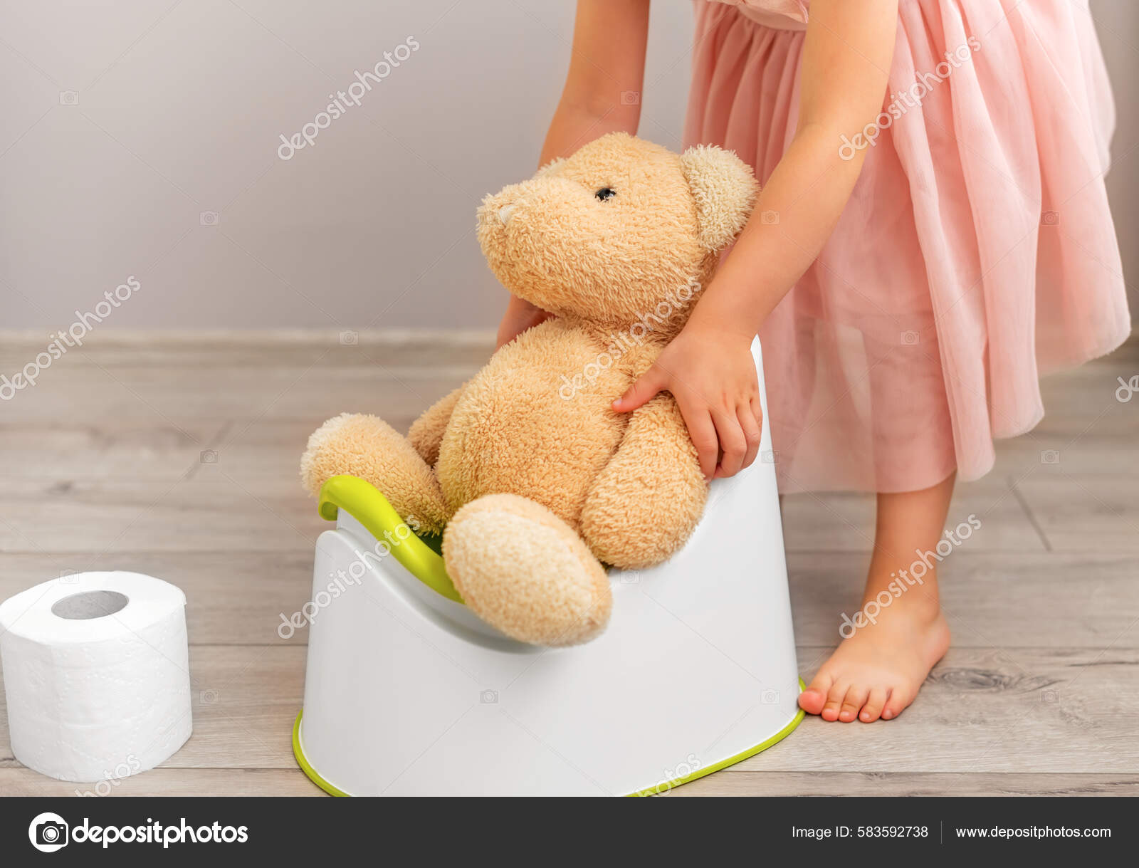 Child Teaches Toy How Use Potty — Stock Photo © tanya.rozhnovskaya ...