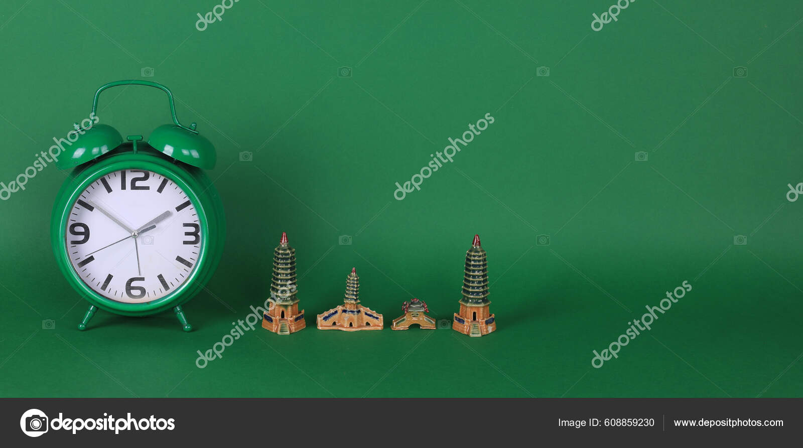 Green Alarm Clock Green Background — Stock Photo © serikbaib #608859230