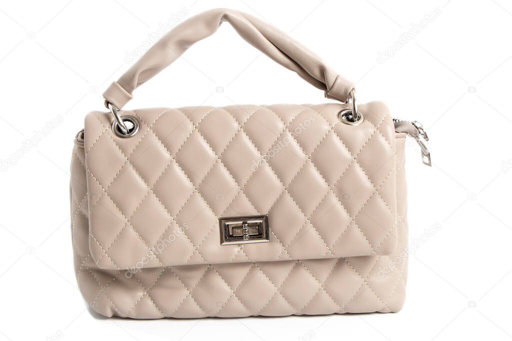 bolsa de cuero acolchada en color beige. Las mujeres de moda embrague ...