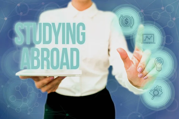 Text sign showing Studying Abroad. Business concept learn outside of ...