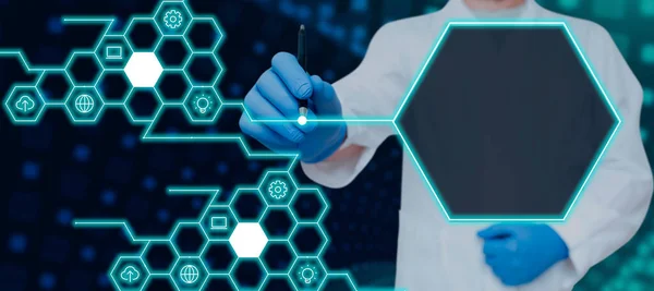 Doctor Presenting Graphical Hexagon With S And Global Connection ...