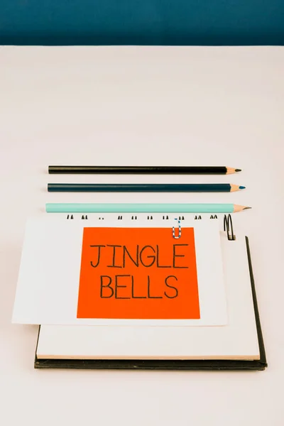 Hand writing sign Jingle Bells, Concept meaning Most famous traditional ...