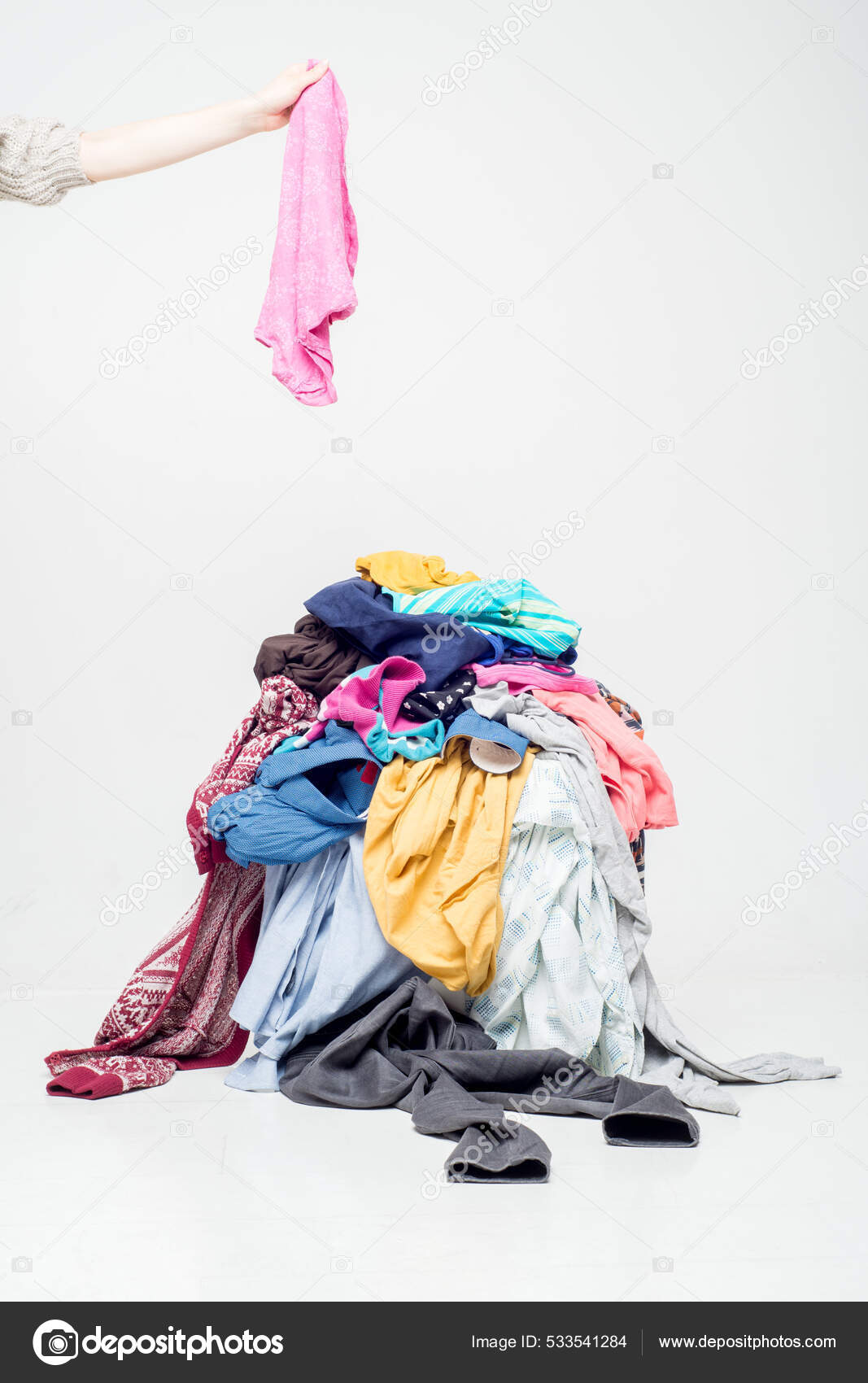 Hand Throws Clothes Pile Used Clothes Pile Used Clothes Light Stock ...