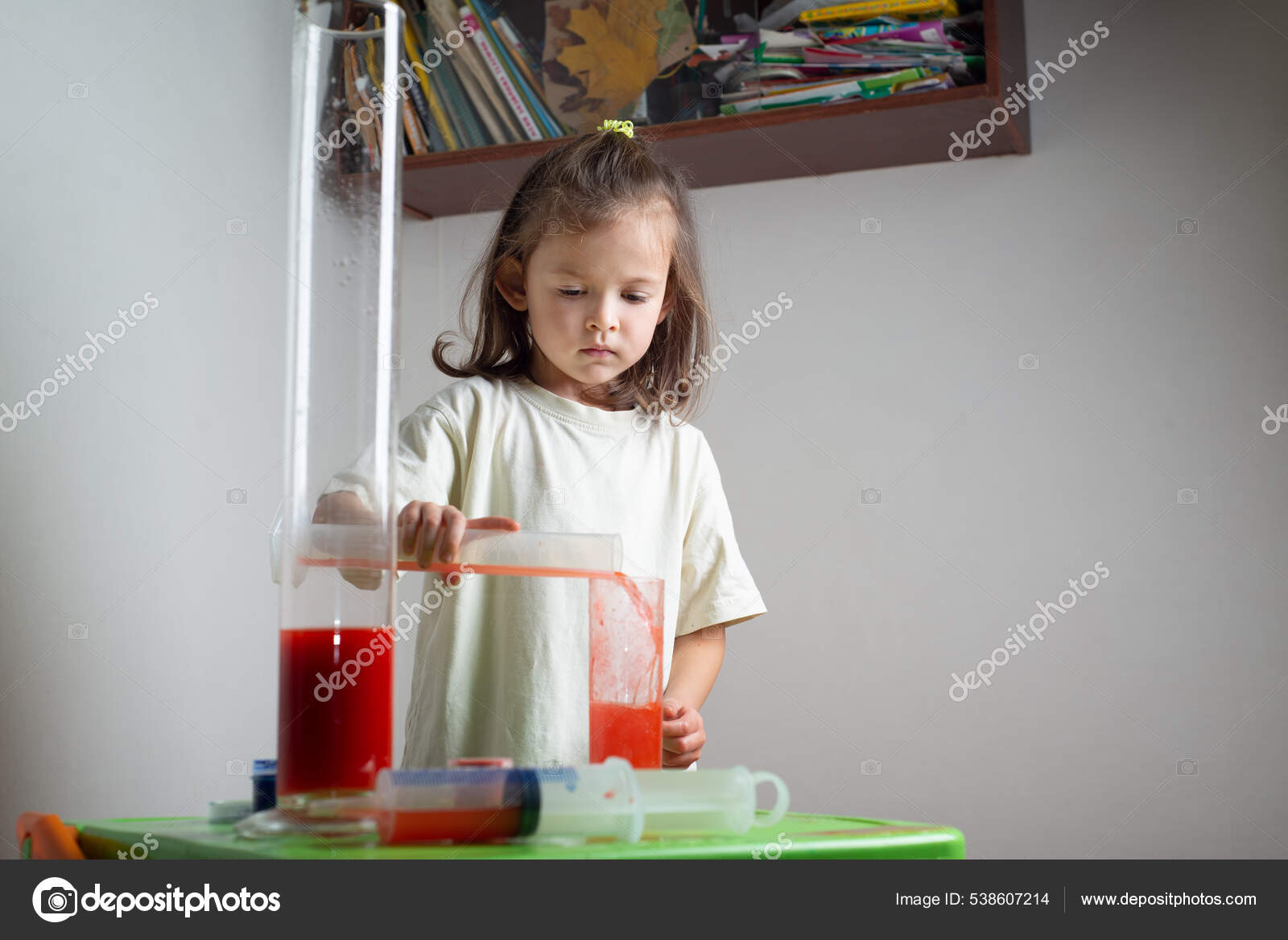Child Pours Colored Liquid Test Tube While Making Chemistry Experiment ...