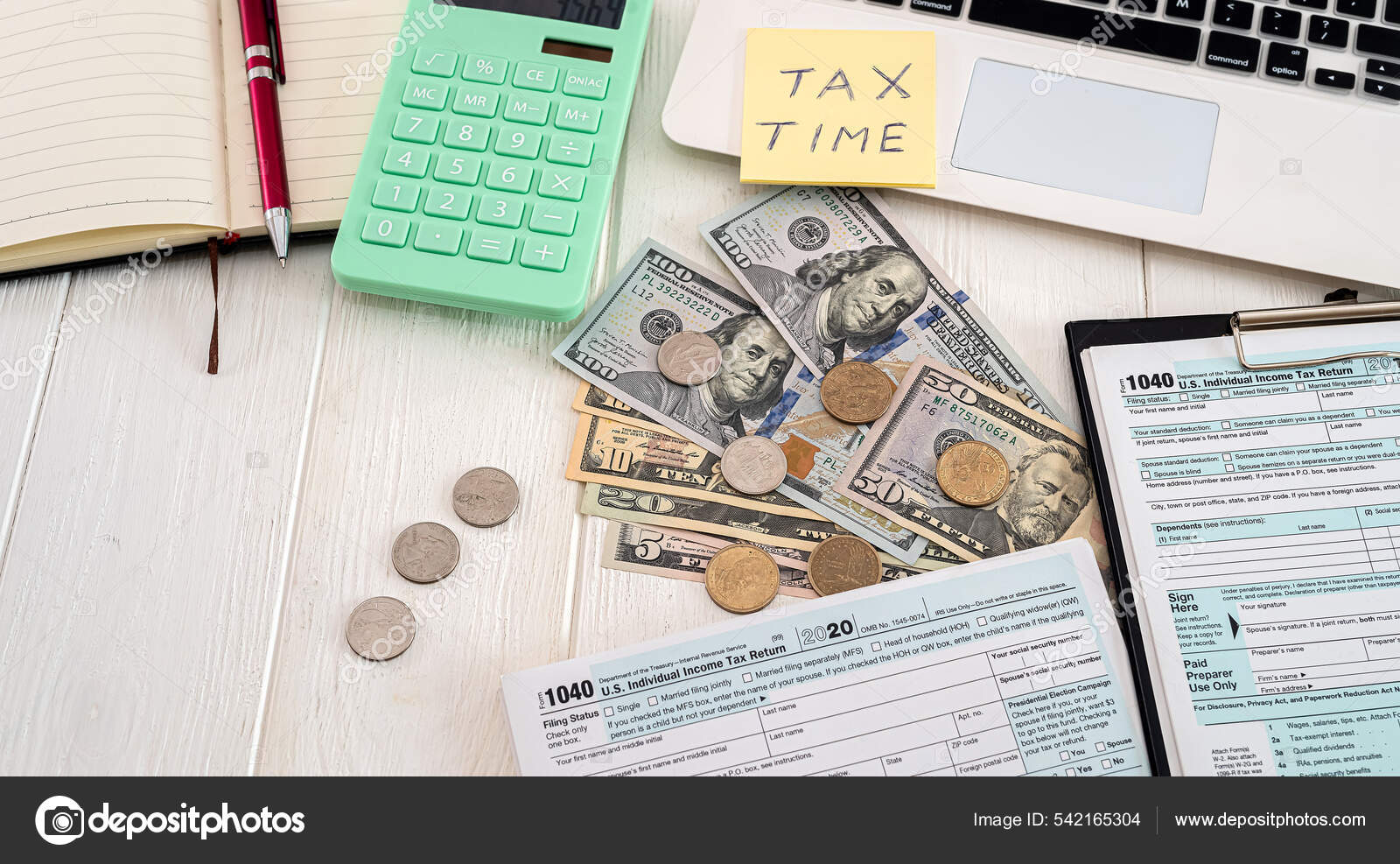 Table Neatly Folded American Forms 1040 Which Coins Pen Calculator ...