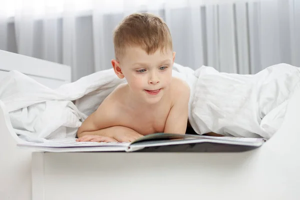 Kid reading newspaper Stock Photos, Royalty Free Kid reading newspaper ...