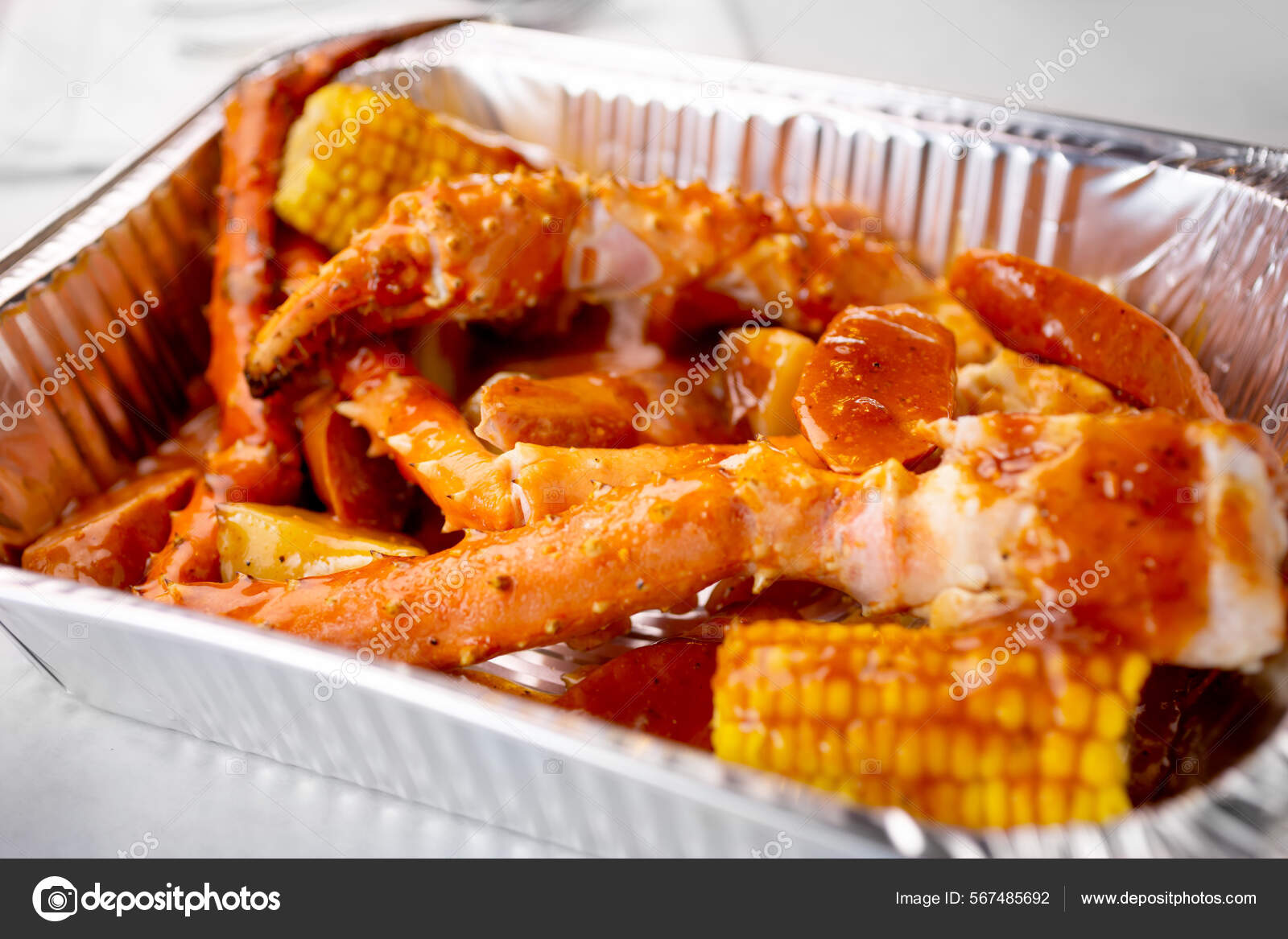 View Tin Container King Crab Legs Boil — Stock Photo © PBT #567485692