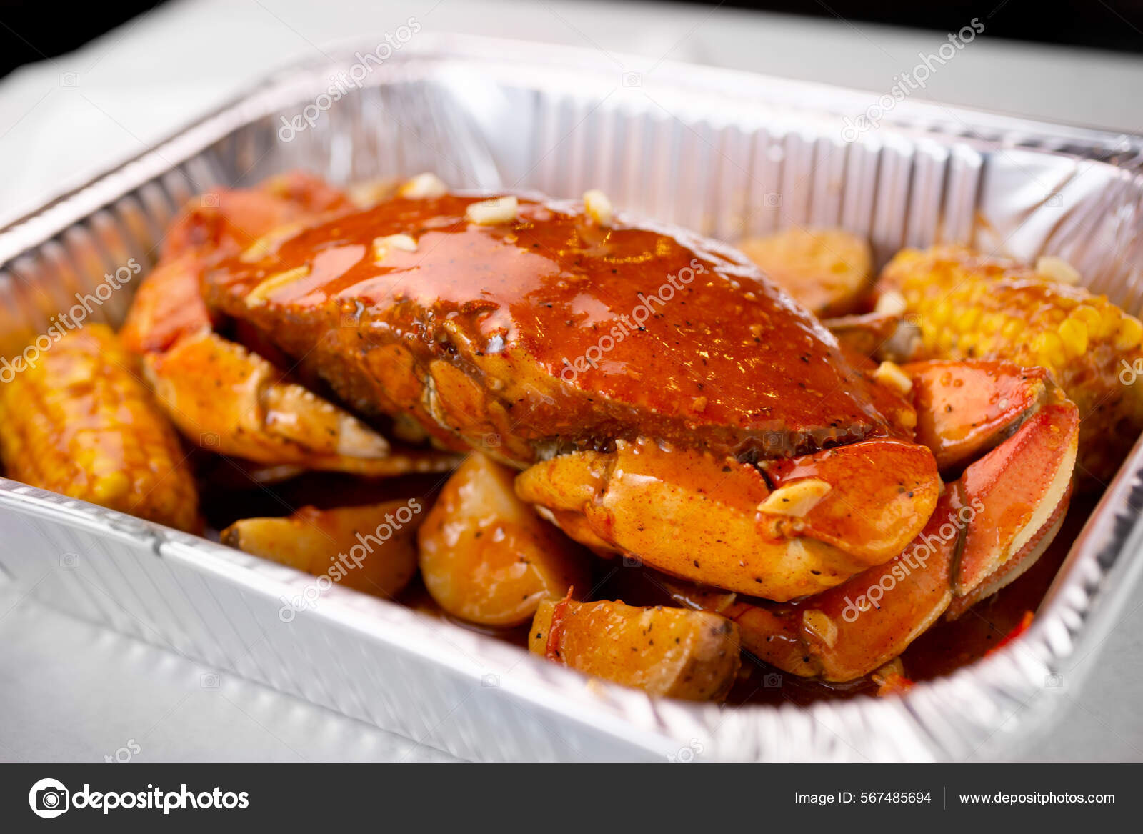 View Tin Container Dungeness Crab Boil — Stock Photo © PBT #567485694