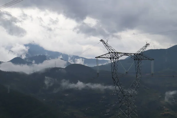 high voltage power lines in the mountains - Stock Image - Everypixel