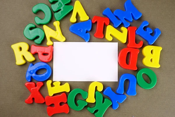 Colorful English alphabet with empty white paper for copy space - Stock ...