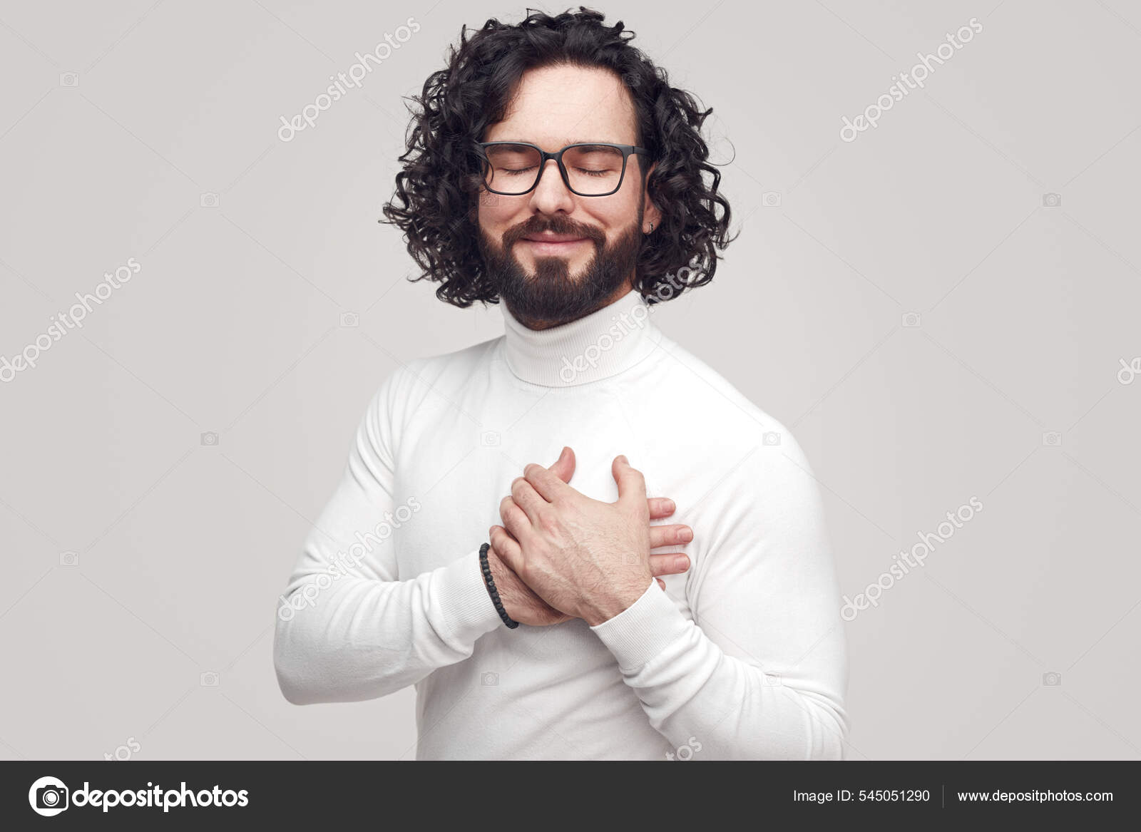 Content man expressing tender feelings Stock Photo by ©kegfire 545051290