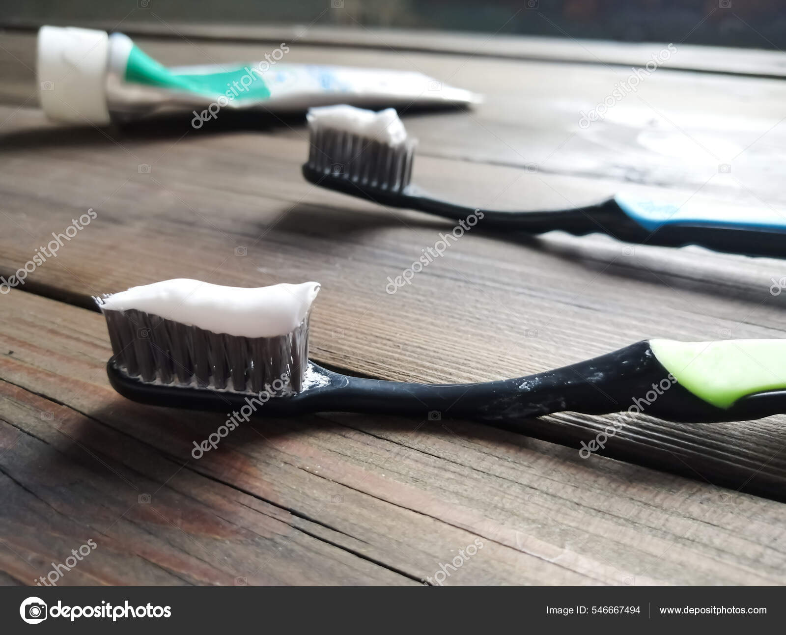 Two Toothbrushes Toothpaste Them Lie Wooden Table Background Tube ...