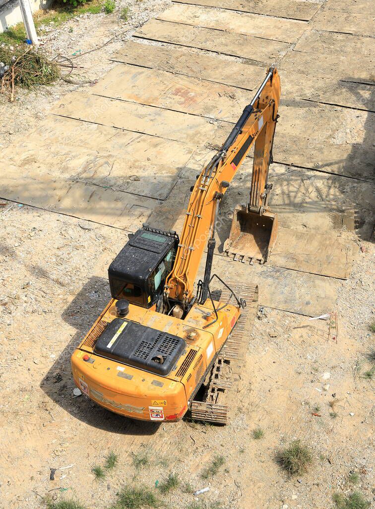 Excavator with hydraulic hammer or Backhoe for the destruction of ...