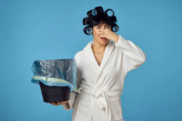 Woman in white robe housework cleaning service blue background Stock ...