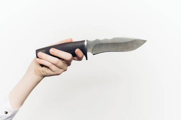 Female Hand Holding Knife