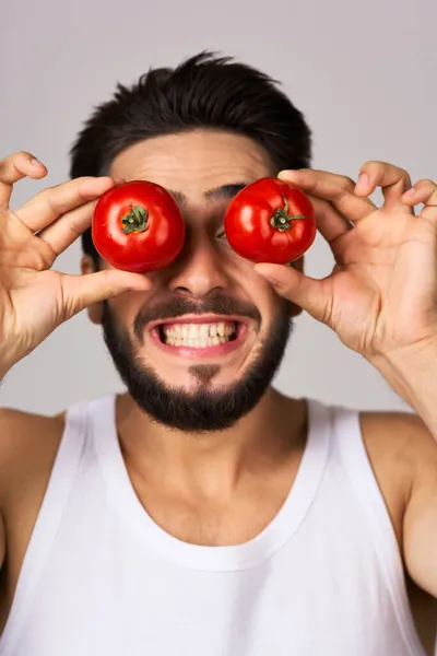 Man eating tomatoes Stock Photos, Royalty Free Man eating tomatoes ...