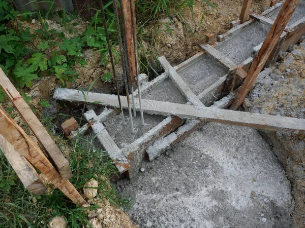 Filling reinforced beam with the concrete reinforcement frame, Timber ...