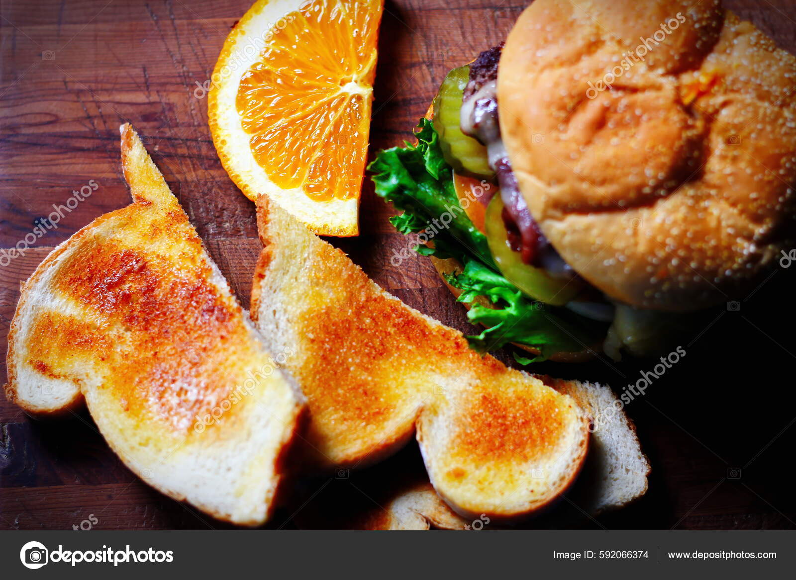 Top View Deluxe Burger Hamburger Being Decorated Serving Wooden Cutting ...