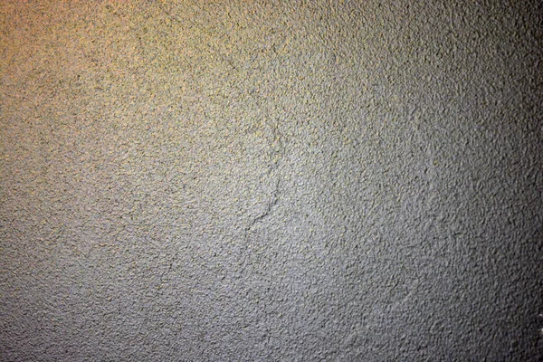 A beautiful structural light gray wall with golden highlights ...