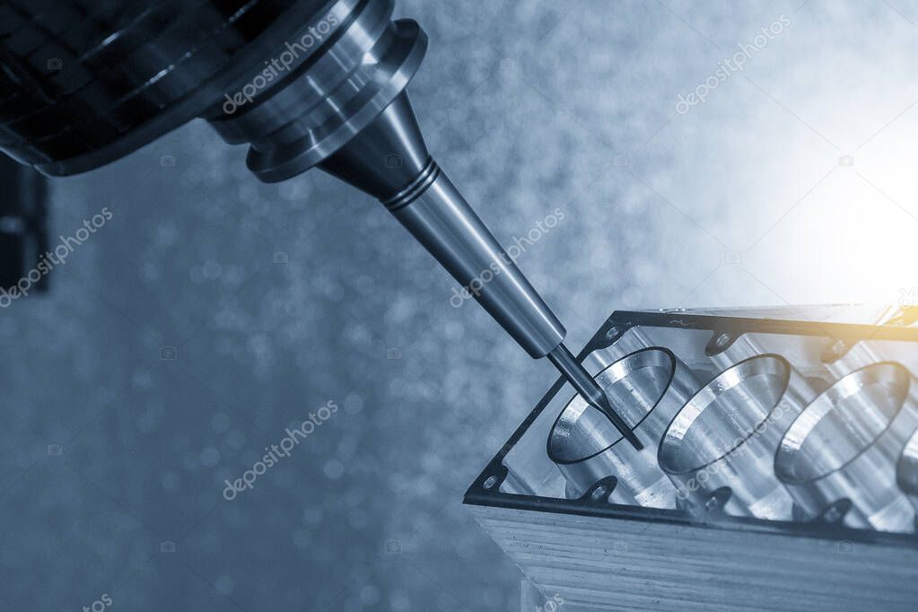 The 5-axis machining center cutting the V8 cylinder block with solid ...