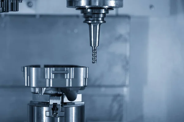 The 4-axis machining center cutting the aluminum gear housing parts ...