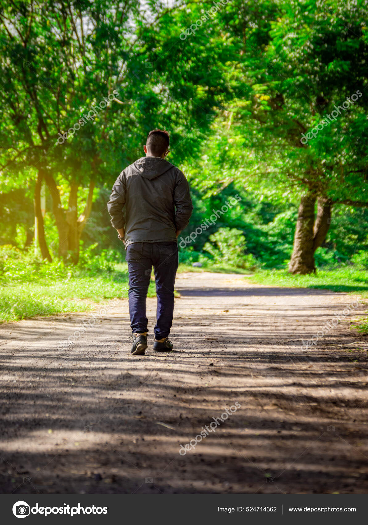 Man Walking Alone On Road