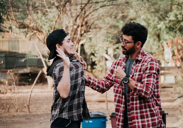 Concept of two men fighting, man threatening another man, concept of ...