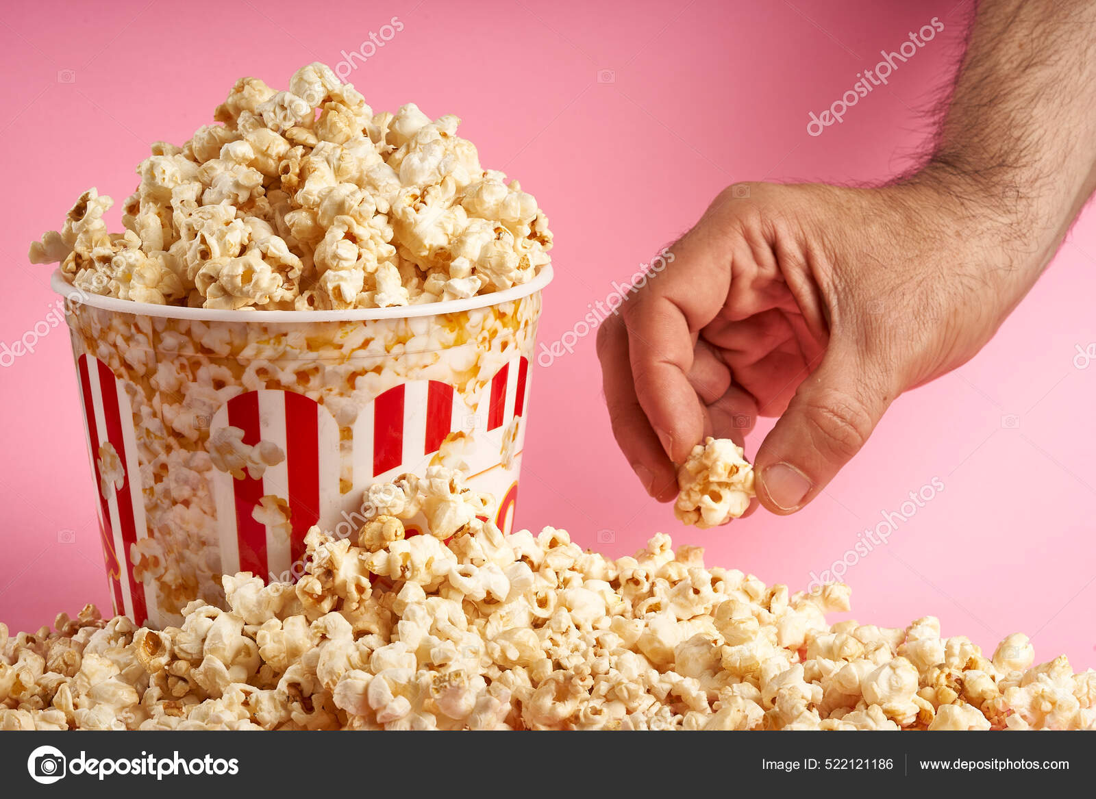 Hand Grabbing Popcorn Out Bucket Pink Background — Stock Photo ...