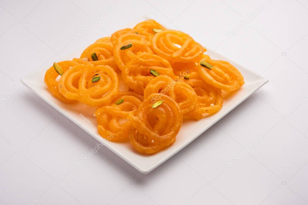 Foto de Jalebi o Jilbi o imarati, comida dulce india frita en ghee puro ...