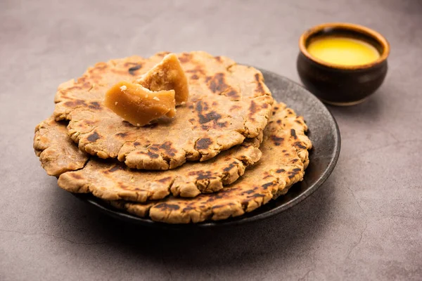 Sweet roti made out of rice flour, jaggery, and ghee. Gud ki roti. gur ...
