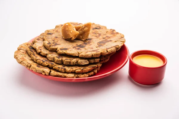 Sweet roti made out of rice flour, jaggery, and ghee. Gud ki roti. gur ...