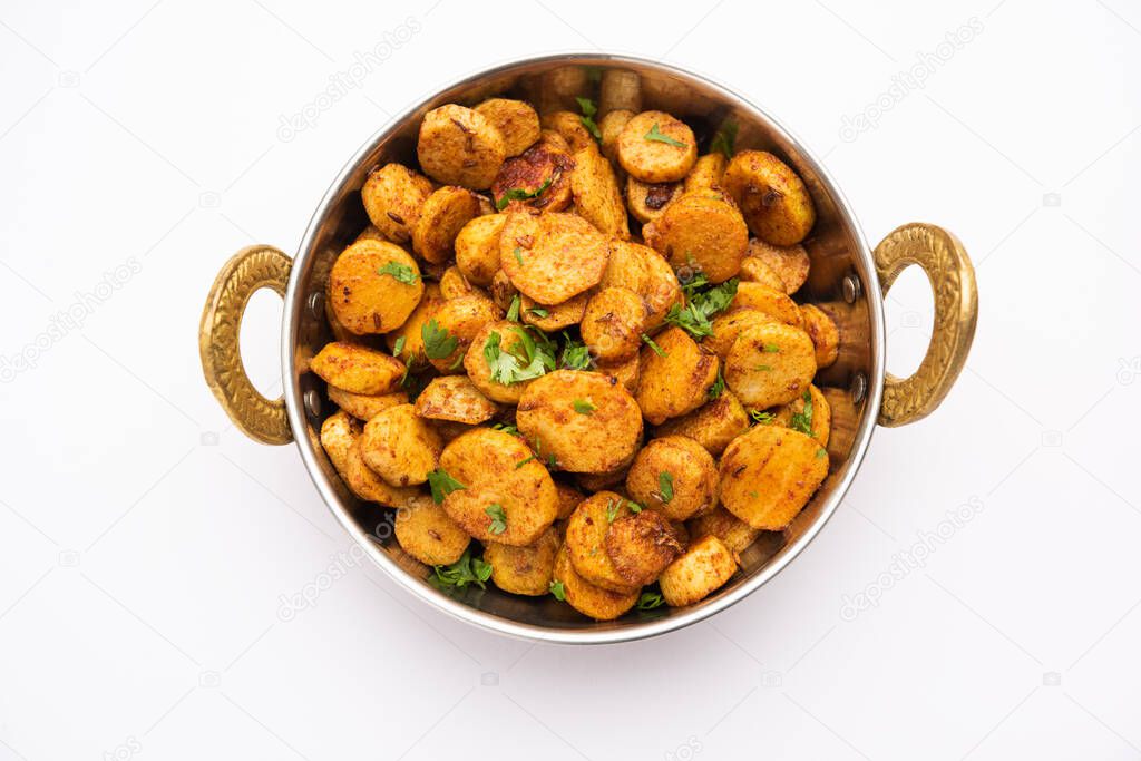 Stir fried taro roots. Arbi ki sabji, ghuiya masala curry Sabzi or arvi ...