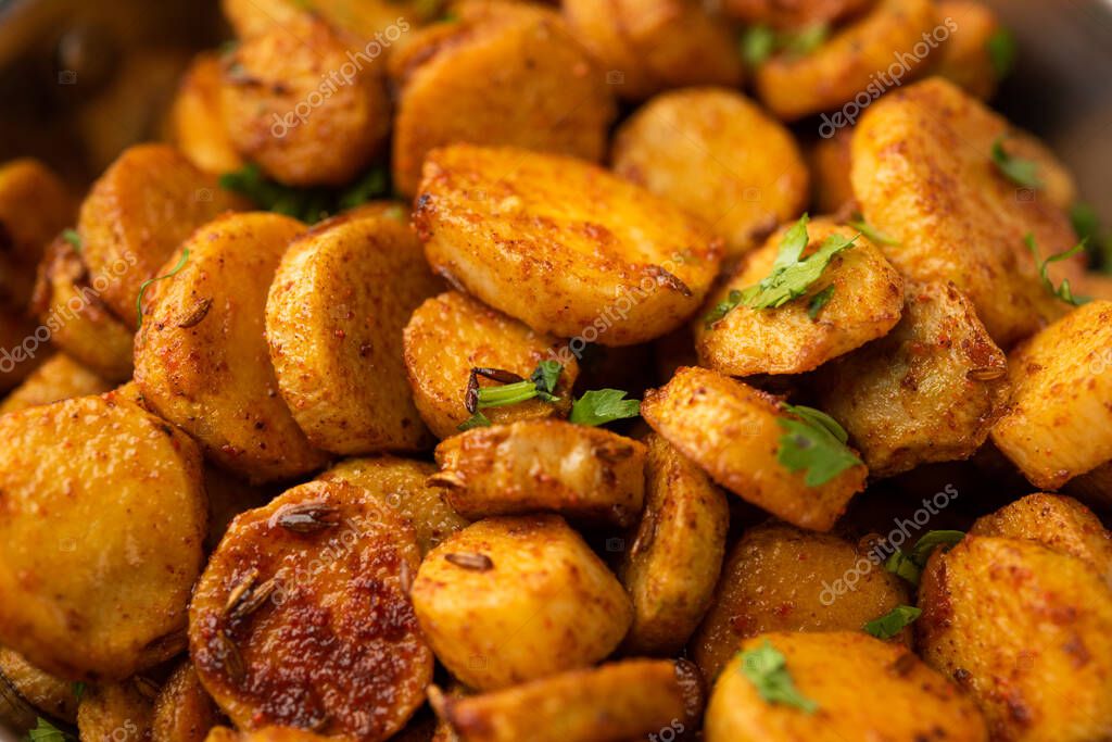 Stir fried taro roots. Arbi ki sabji, ghuiya masala curry Sabzi or arvi ...