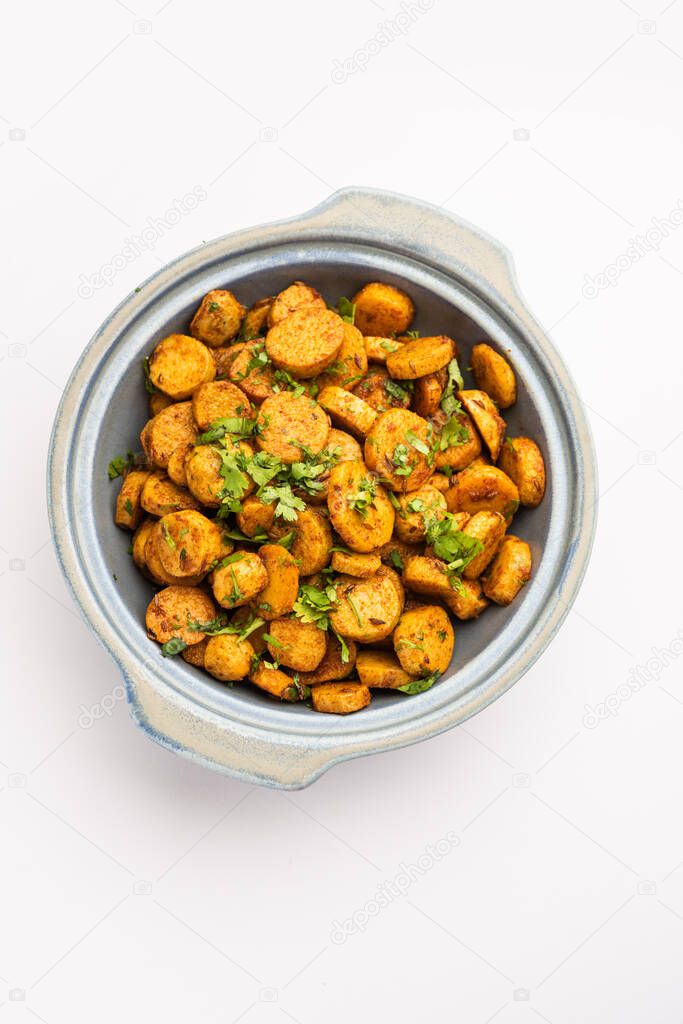 Stir fried taro roots. Arbi ki sabji, ghuiya masala curry Sabzi or arvi ...