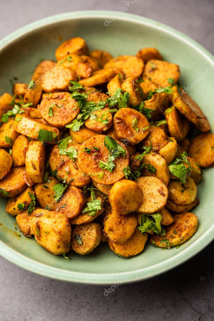 Stir fried taro roots. Arbi ki sabji, ghuiya masala curry Sabzi or arvi ...