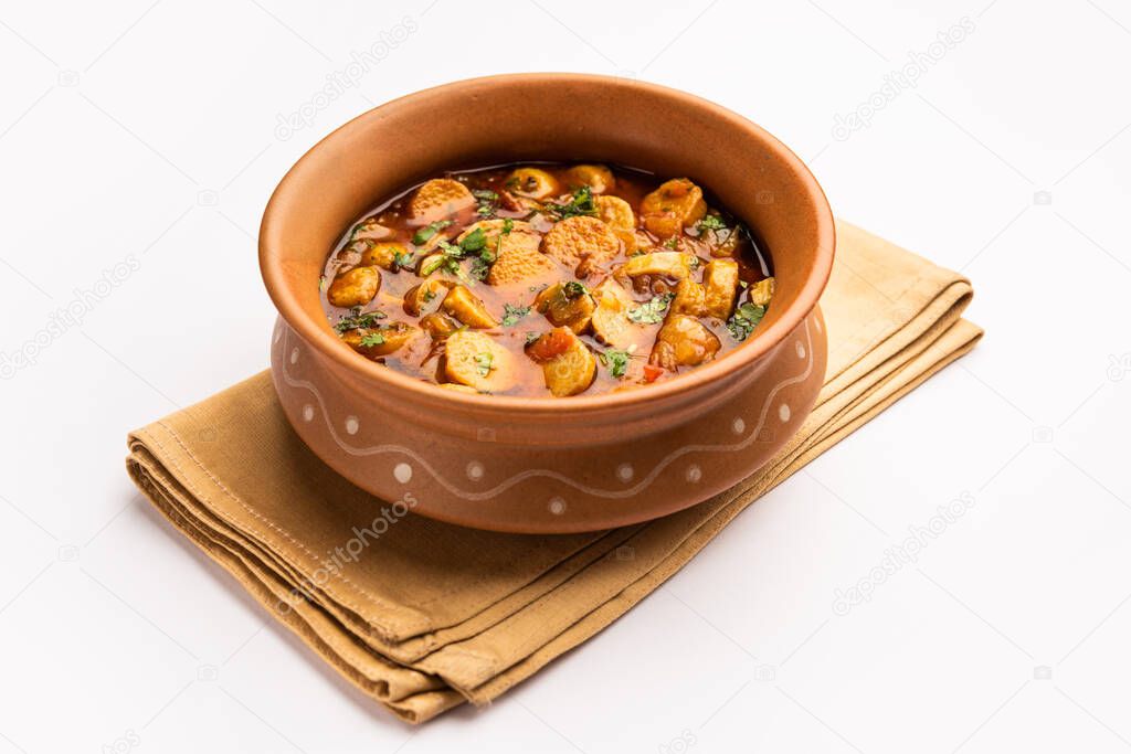 Stir fried taro roots. Arbi ki sabji, ghuiya masala curry Sabzi or arvi ...