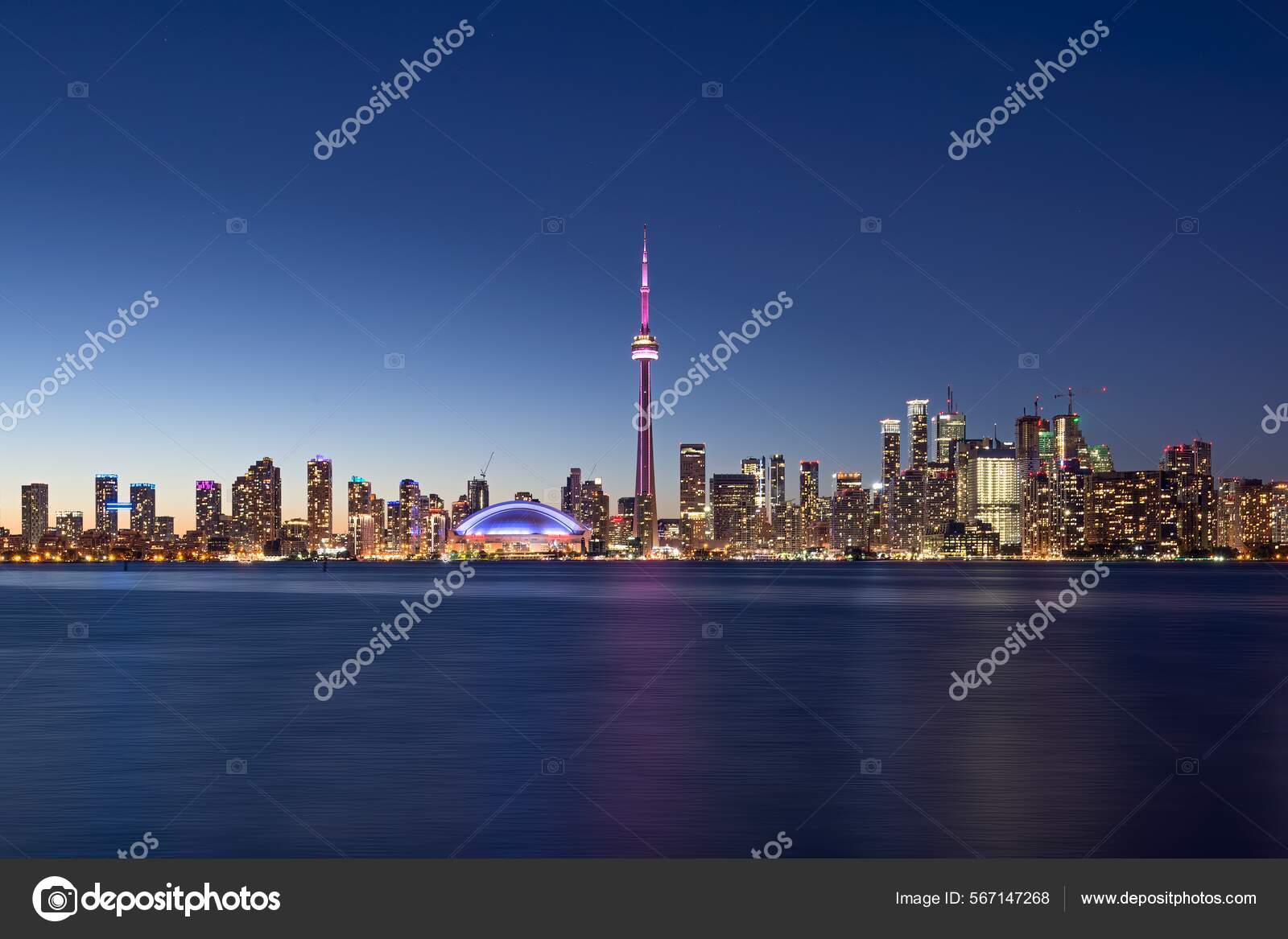 Toronto s skyline at dusk as seen from Centre Island — Stock Photo ...
