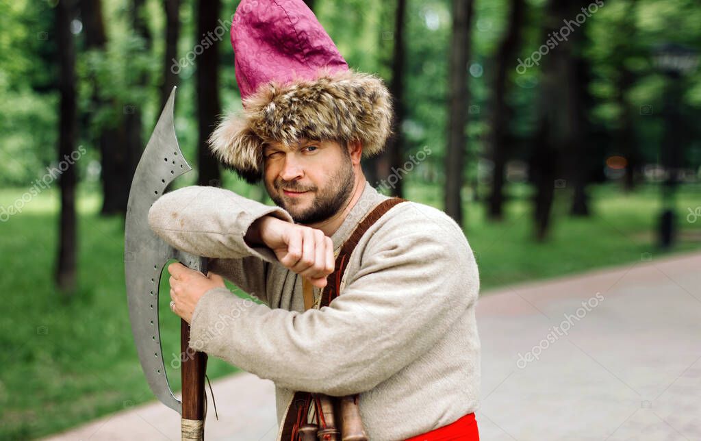 Cosaco de la ciudad 1ª mitad del siglo XVII. En un caftán, un sombrero ...