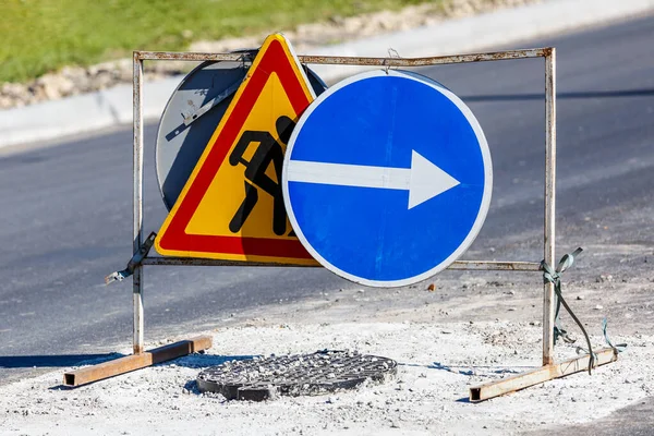 Road signs!Road works with trucks and traffic signs.road works road ...