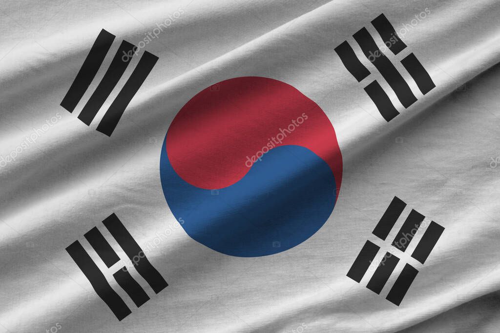 Bandera de Corea del Sur con grandes pliegues ondeando de cerca bajo la ...