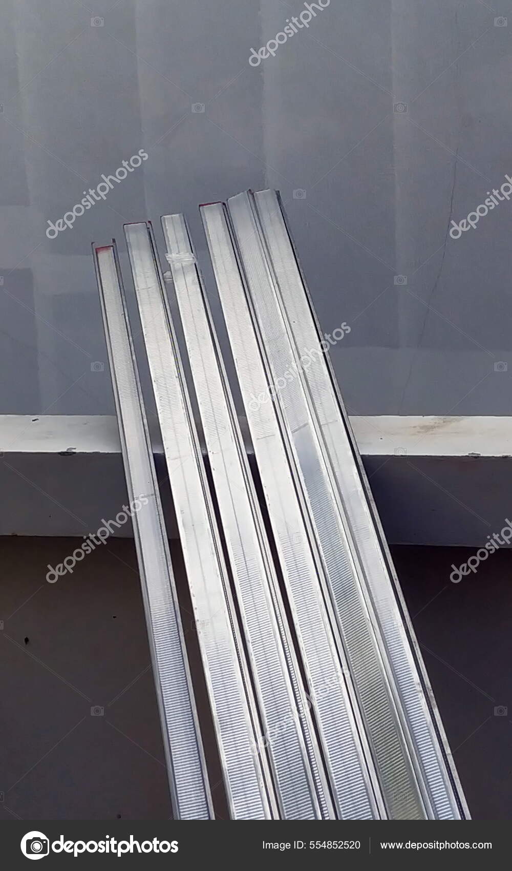 Group Rebar Leans Edge Cement Wall — Stock Photo © rachaneekant@gmail ...