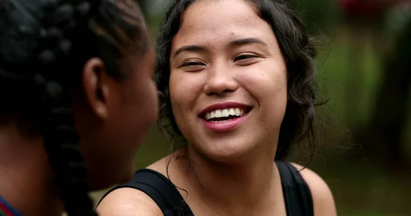 Two friends real life laugh and smile together outdoors - Stock Image ...