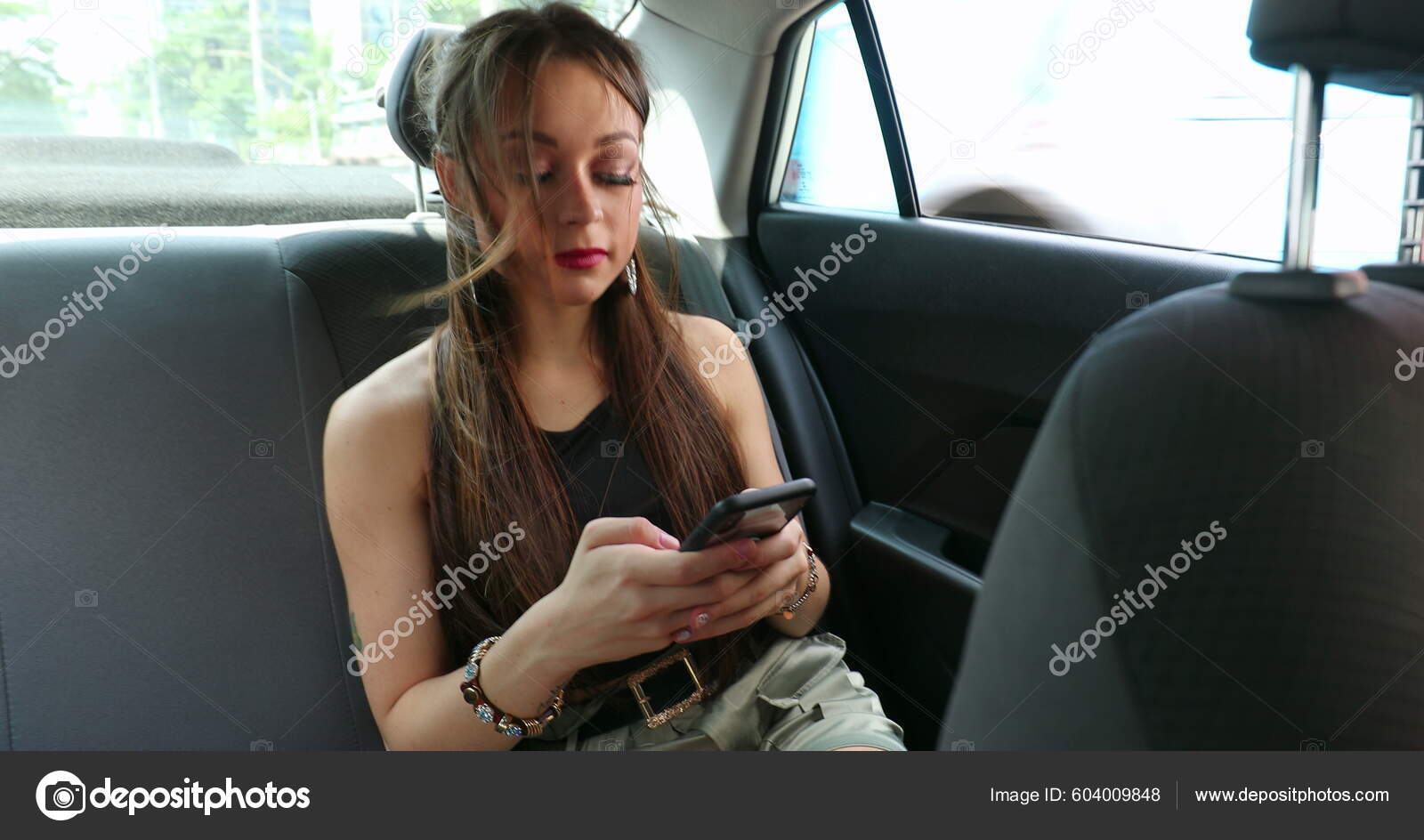 Beautiful Passenger Girl Back Seat Car Texting Using Cellphone Wind ...
