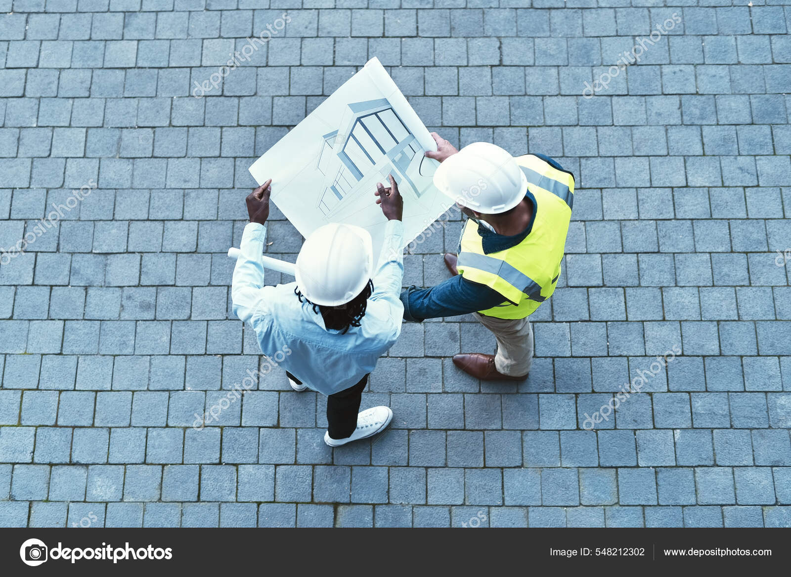 Sharing his ideas and vision. High angle shot of two engineers looking ...