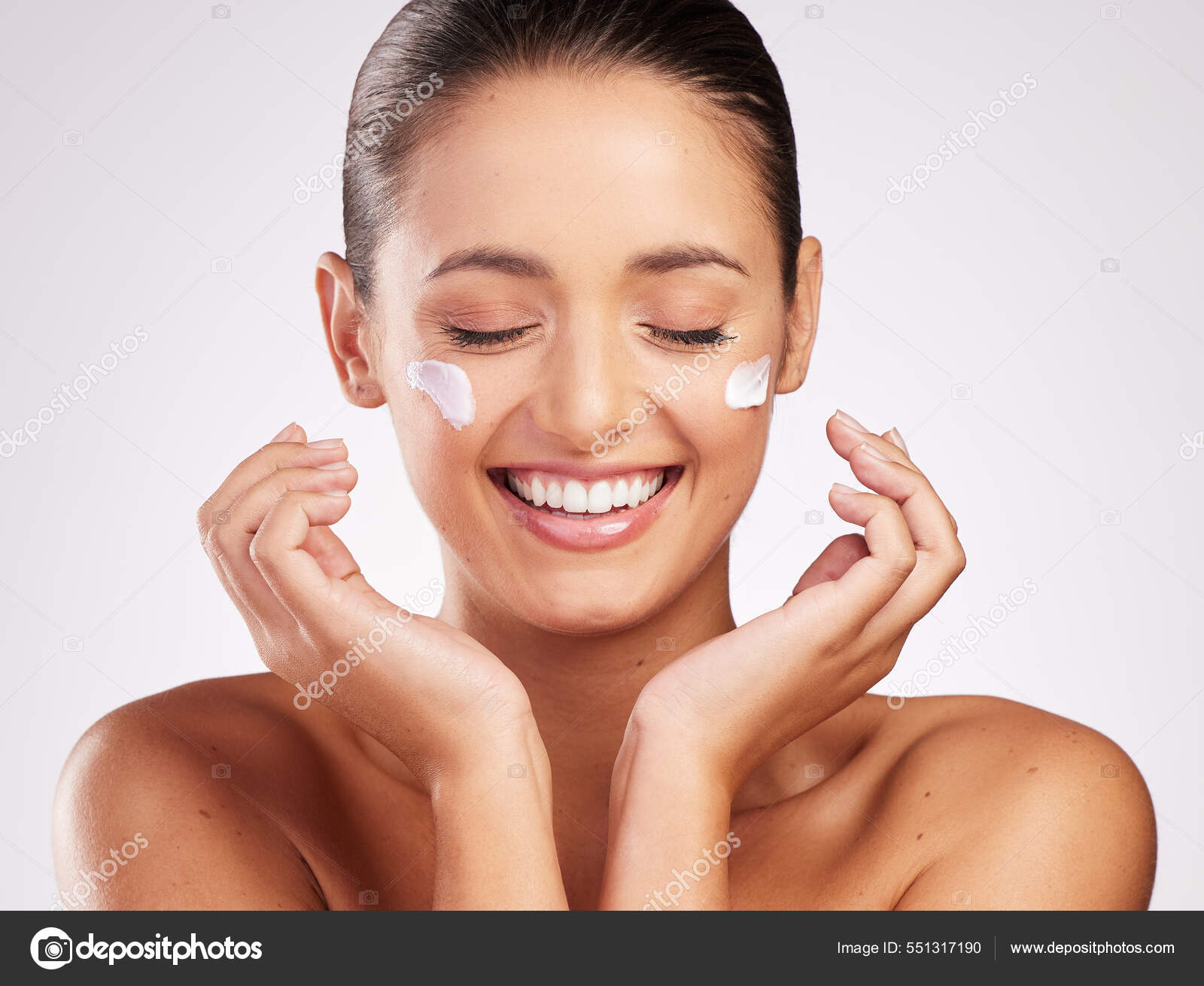 So hydrated you can feel how happy your skin is. Shot of an attractive ...